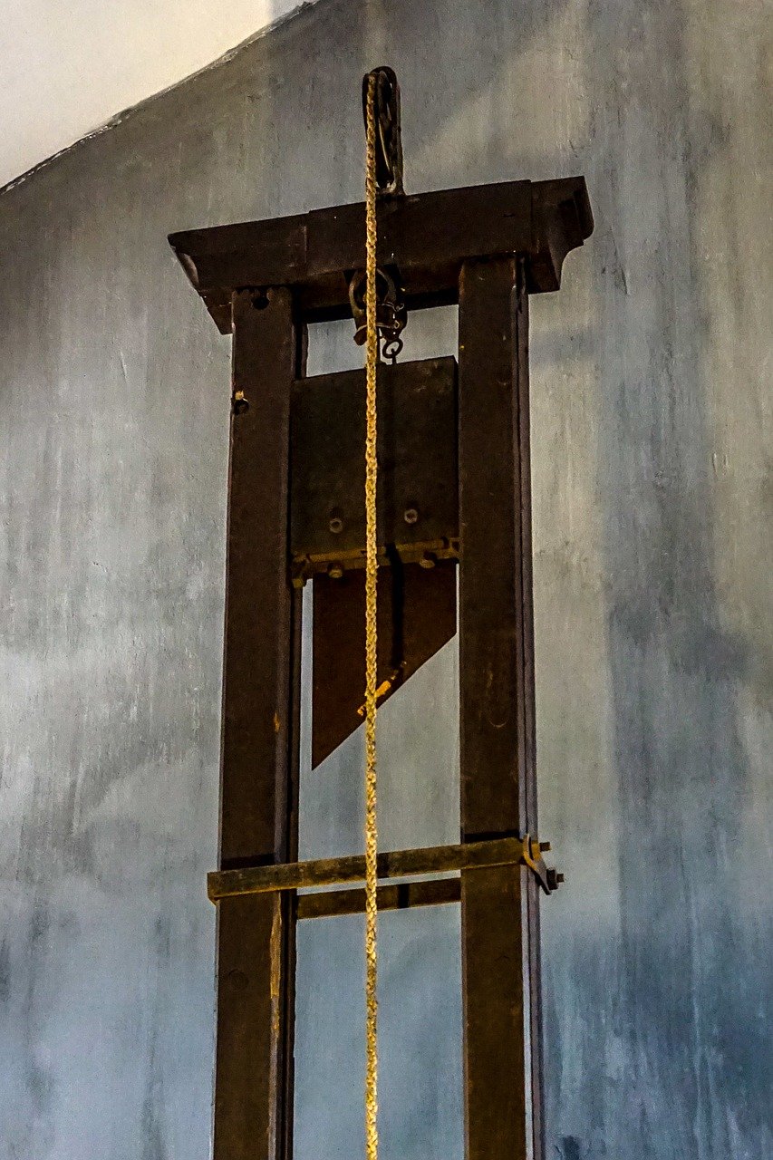 What is the history of the guillotine invention?